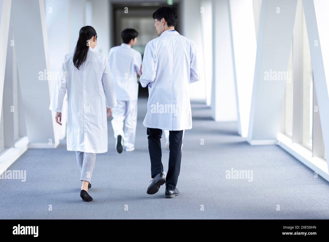 Back view female doctor hi-res stock photography and images - Alamy