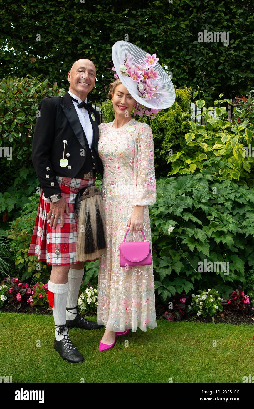 Ascot, UK. 22nd June, 2024. Barney Battles and Tamara Holmgren cut a ...
