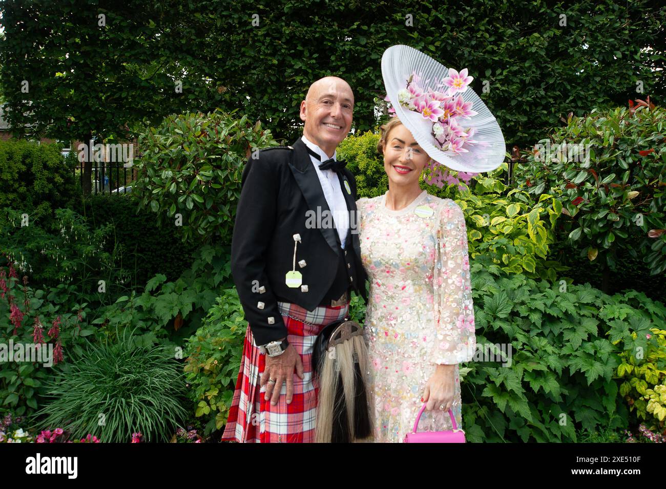 Ascot, UK. 22nd June, 2024. Barney Battles and Tamara Holmgren cut a ...