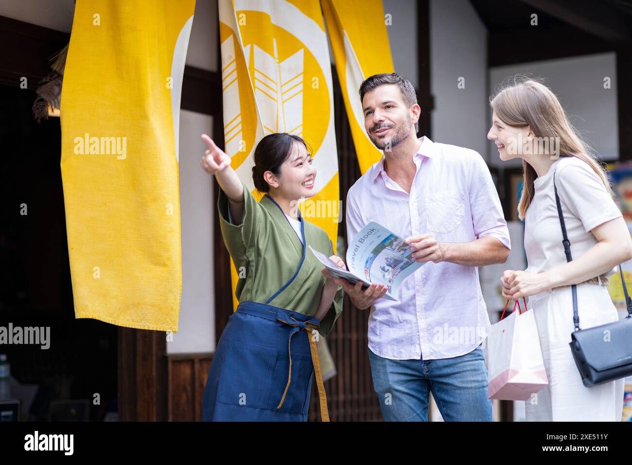 Woman asking directions hi-res stock photography and images - Alamy