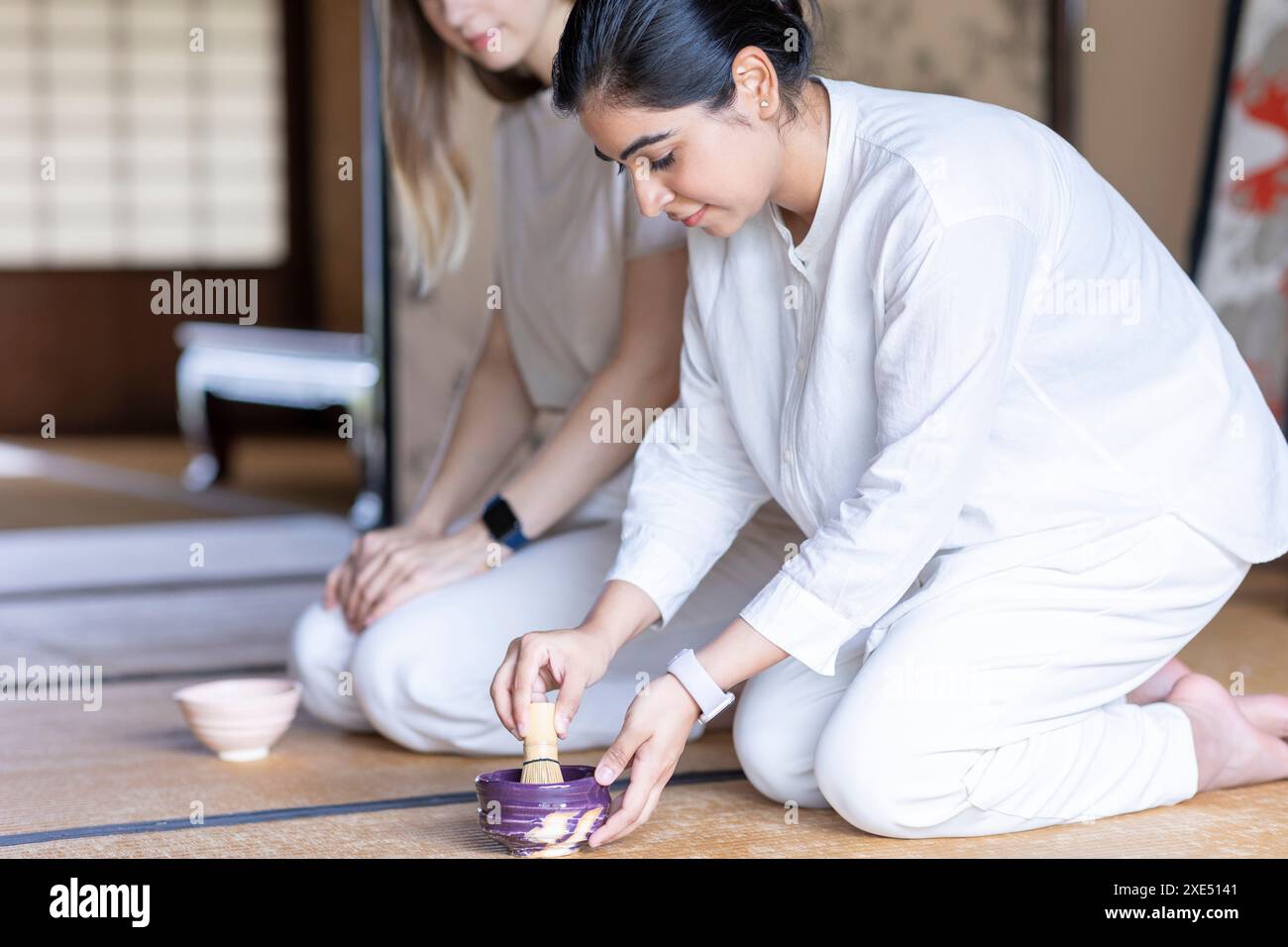 Foreigner making matcha tea Stock Photo - Alamy