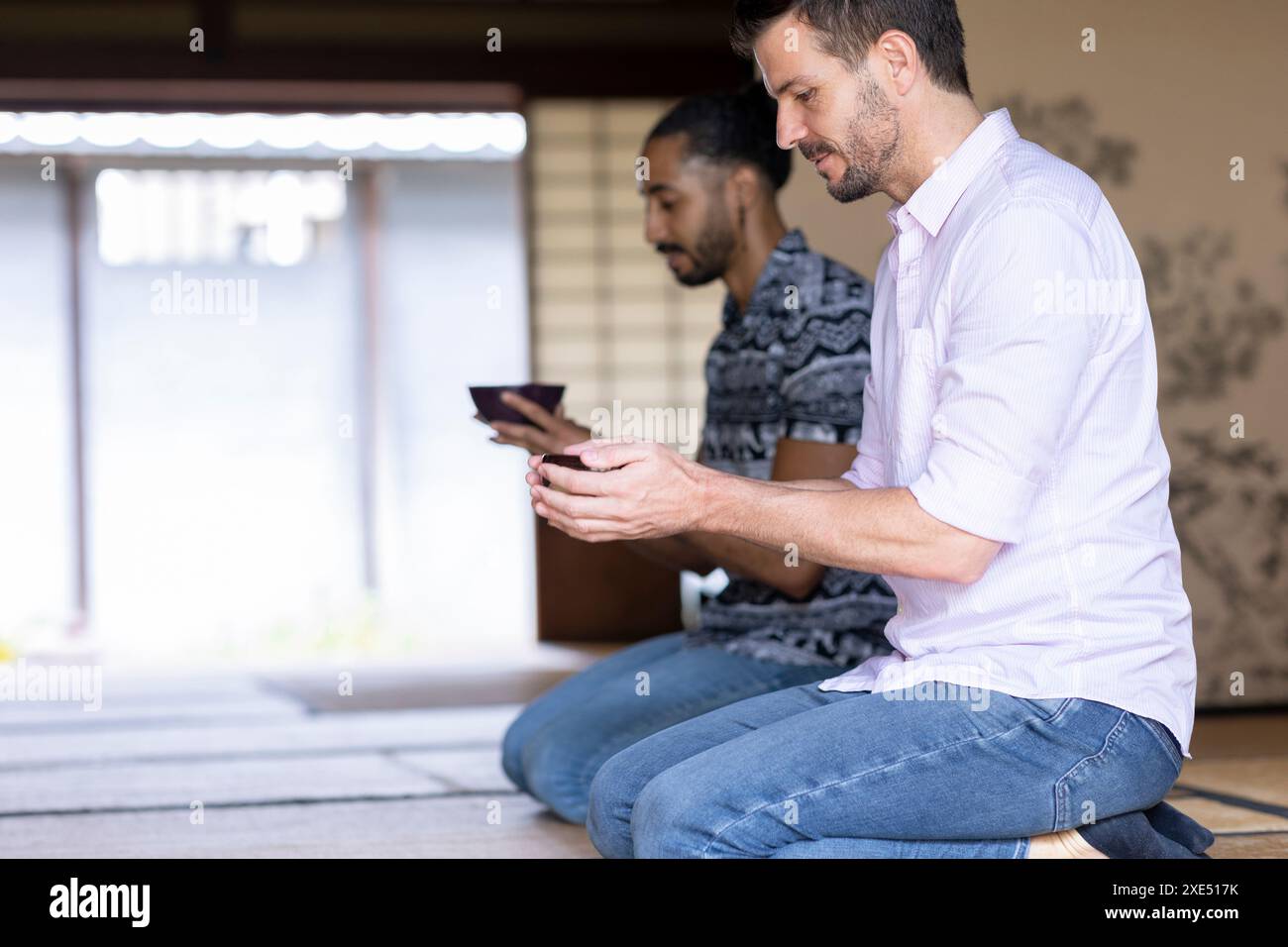 Foreigner receiving matcha tea Stock Photo - Alamy