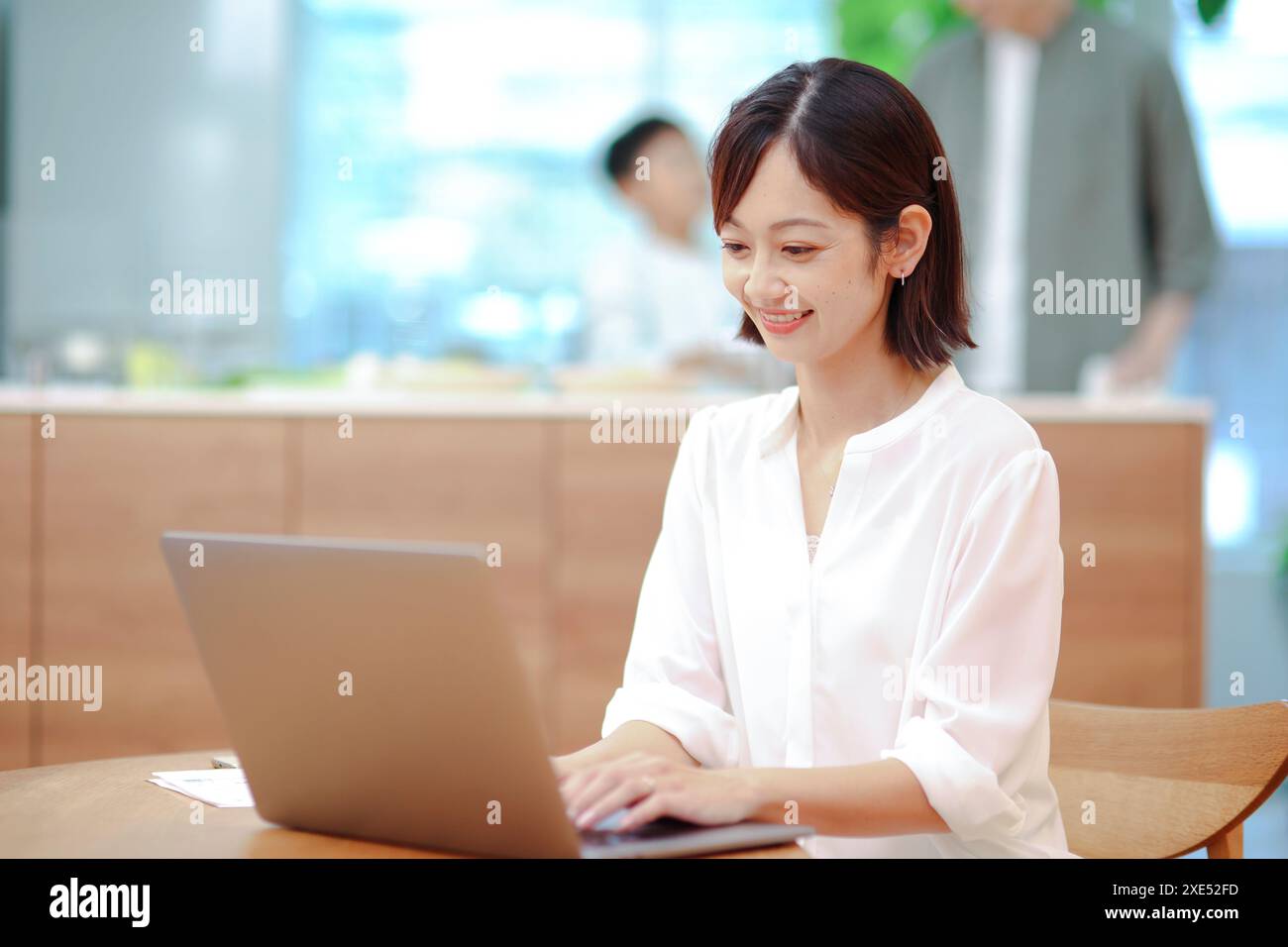Boy operating laptop hi-res stock photography and images - Alamy