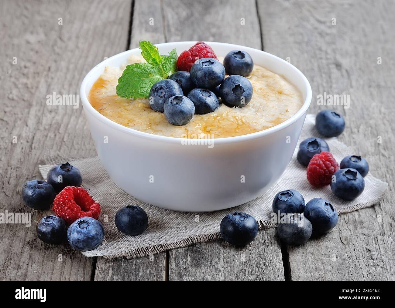 Porridge with mix berry Stock Photo - Alamy