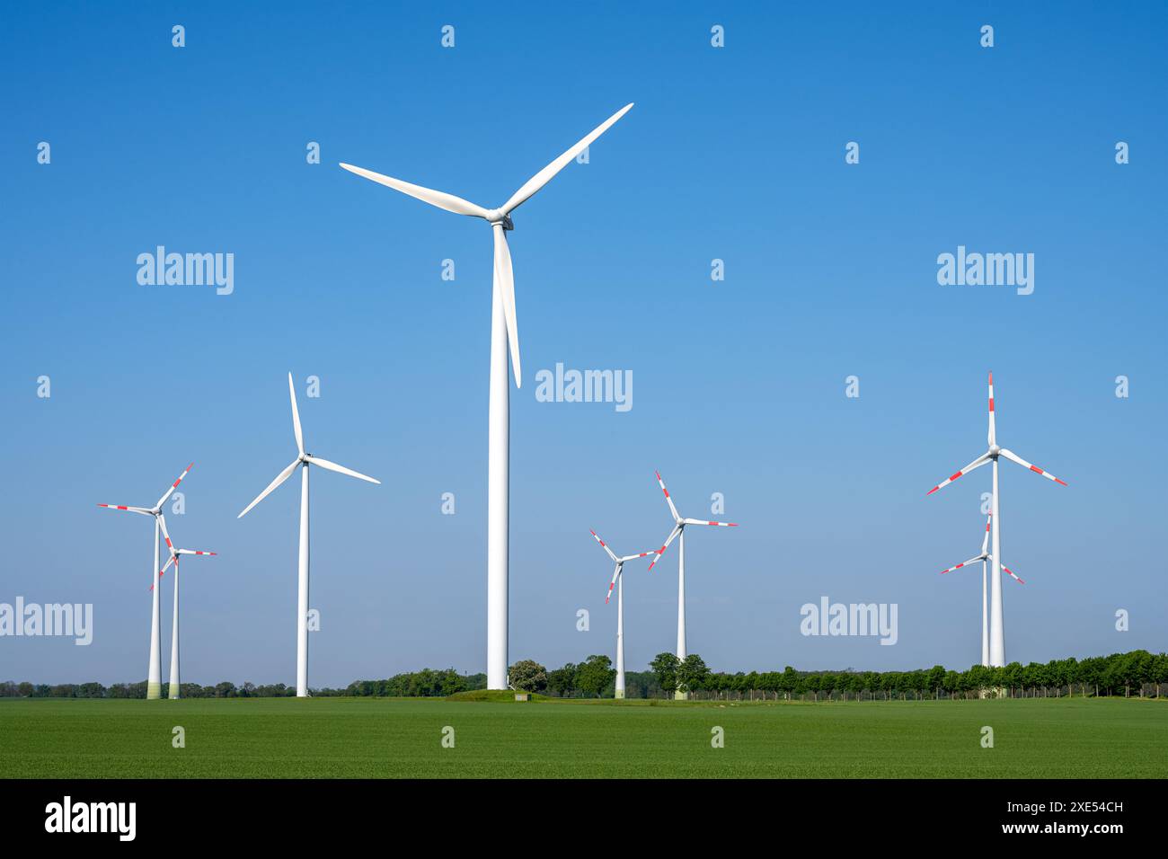 Modern wind turbines in front of a blue sky seen in rural Germany Stock ...