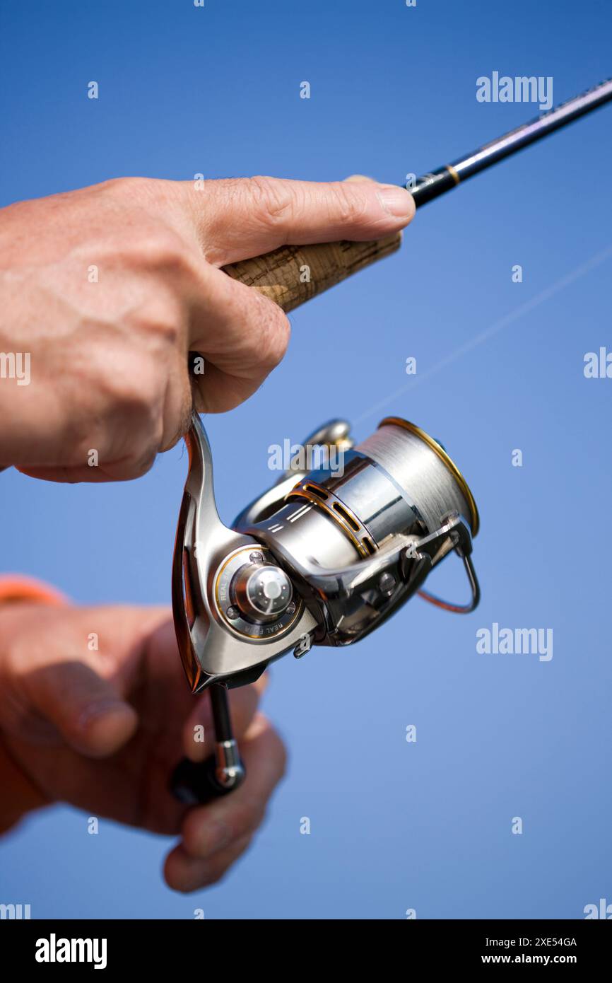 Hand fishing rod hi-res stock photography and images - Alamy