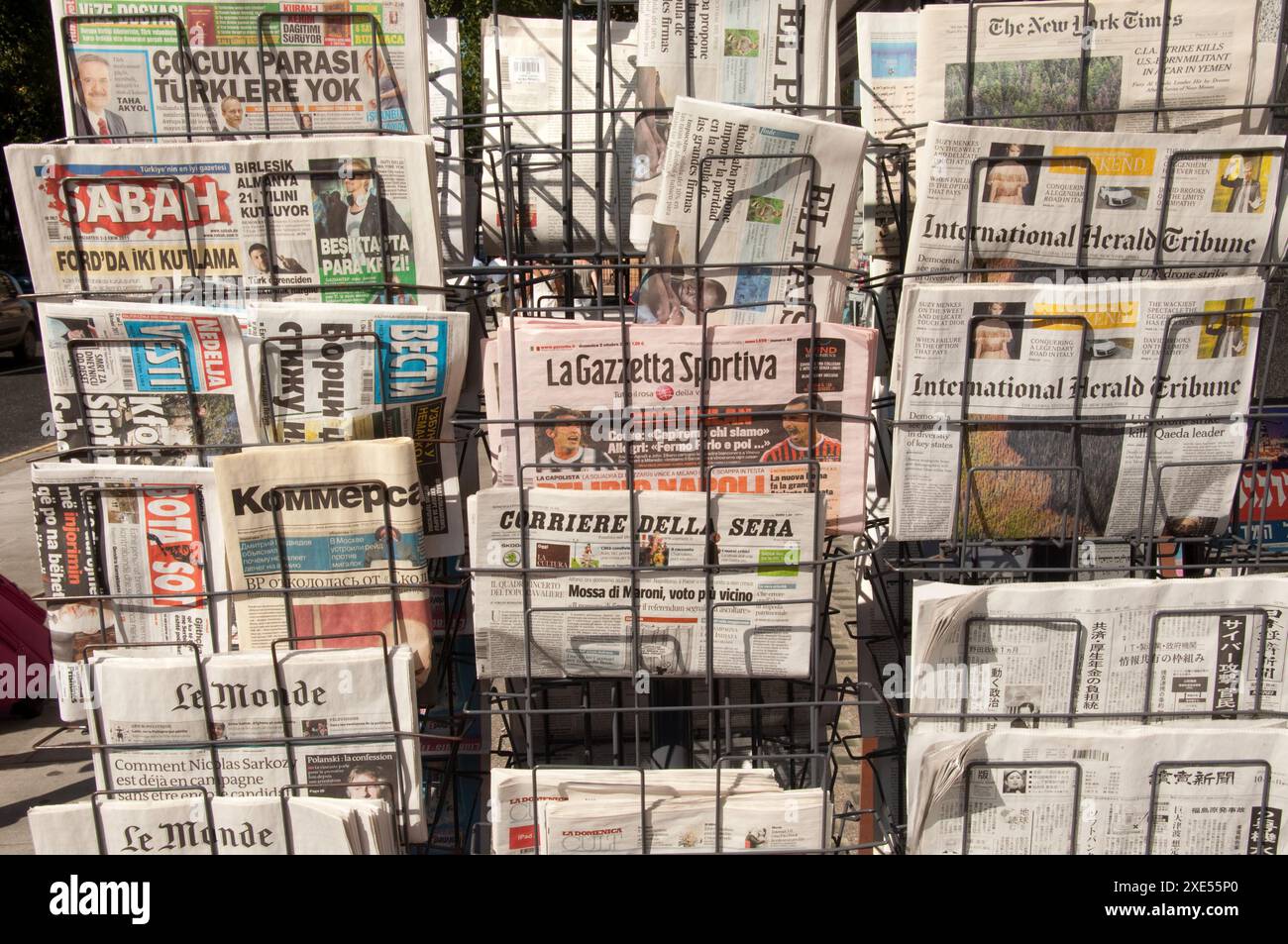 Newspaper stand with newspapers in many languages from many different ...