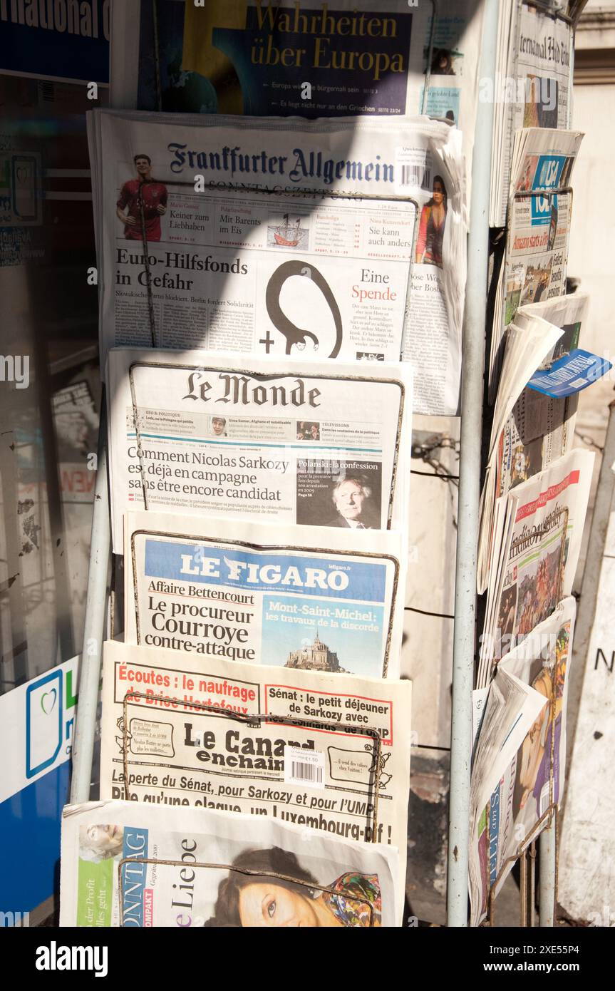 Newspaper stand with newspapers in many languages from many different ...