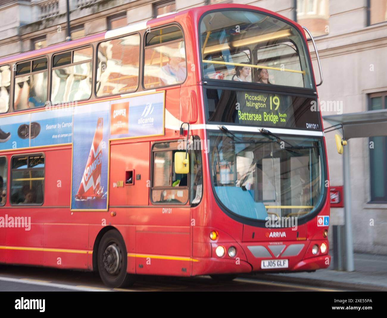 Traditional double-decker London bus, bright red, No. 19; England, UK ...