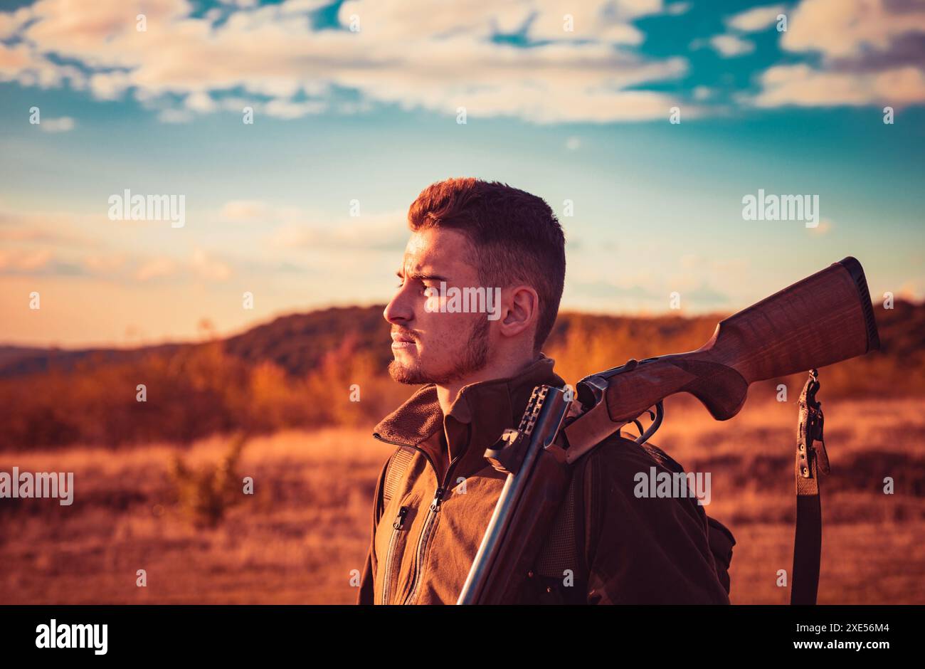 Autumn hunting season. Hunter with shotgun gun on hunt. Autunm hunting ...