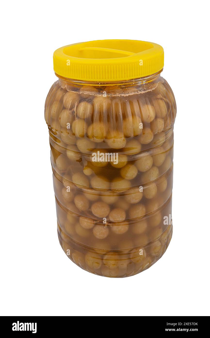 Pickled grapes in plastic jar isolated on white background. Delicious ...