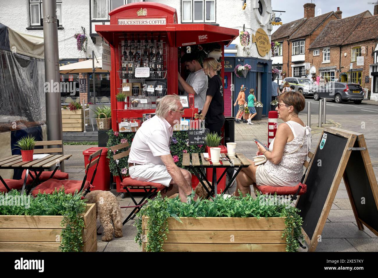 Pavement coffee shop from a converted telephone kiosk with mature ...