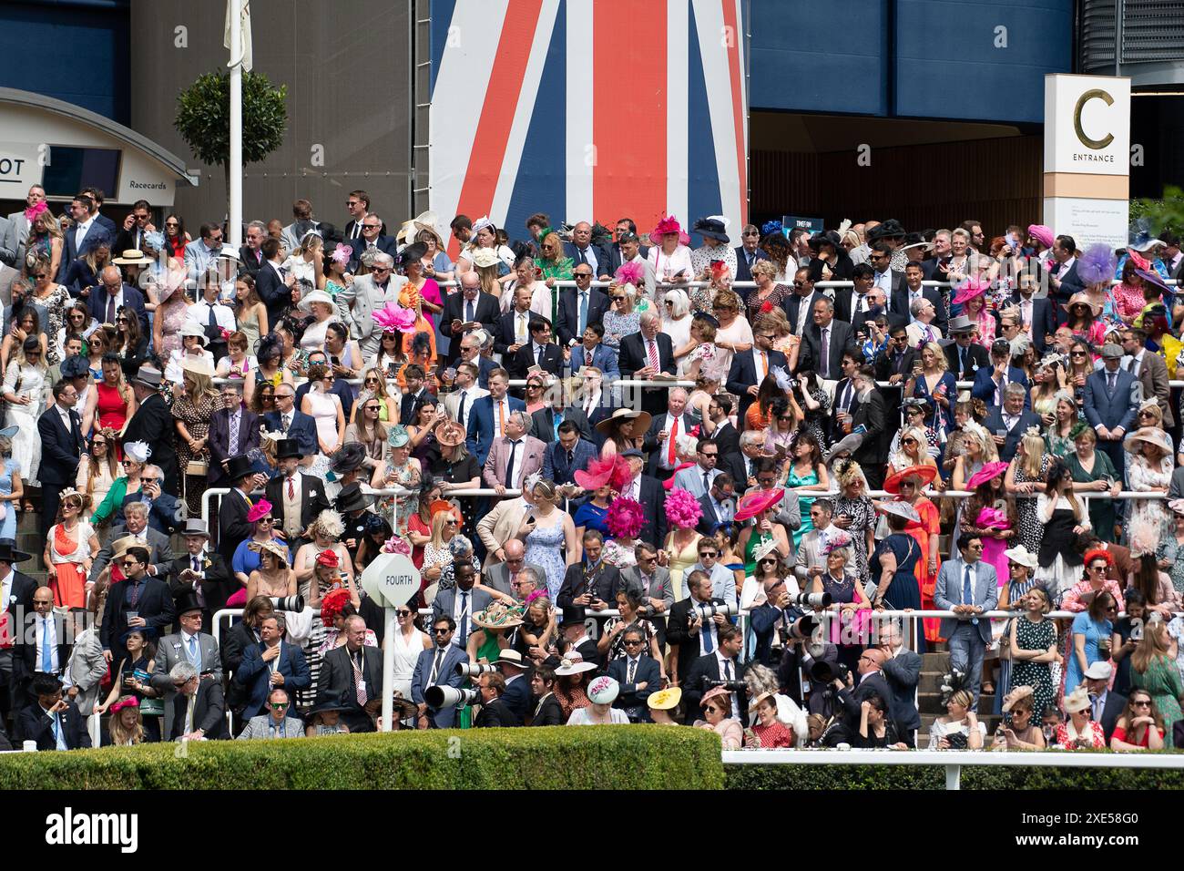 Ascot, UK. 18th June, 2024. Racegoers in the Parade Ring waiting fo for ...