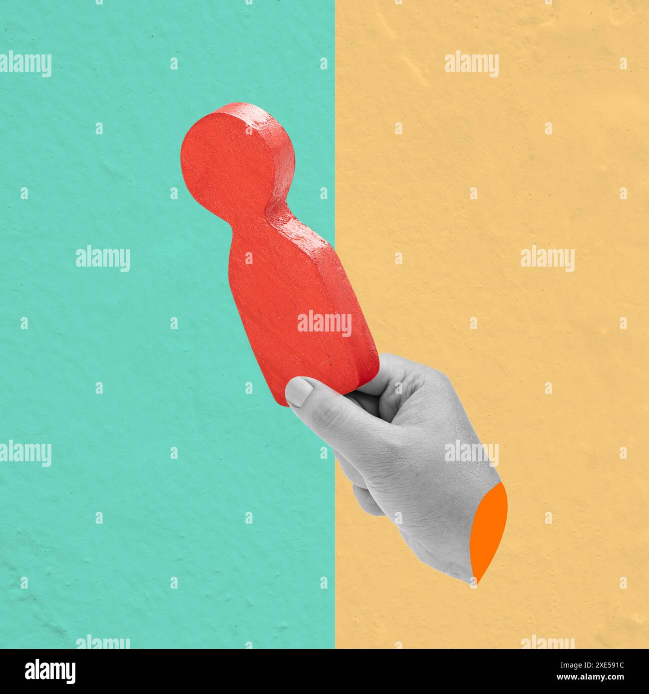 A human hand holding a red human figure with a colored background ...