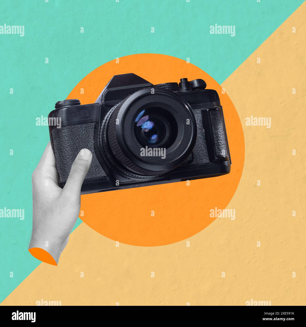 A human hand holding a camera with a colored background. Collage art ...