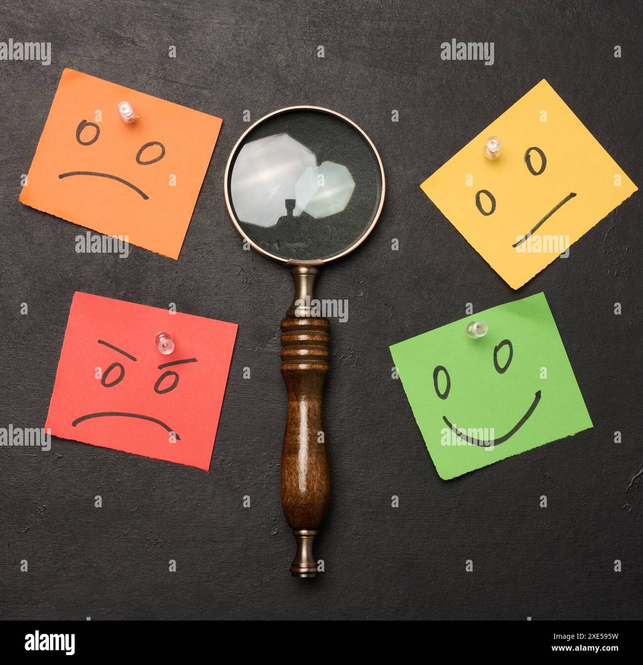 Drawn faces with different emotions on a sticker. Rating and quality ...