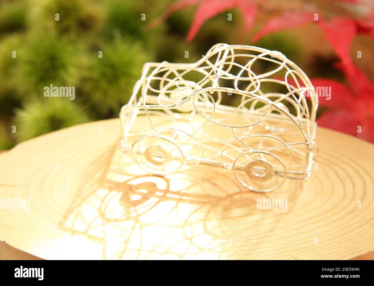 Wire car, chestnuts and autumn leaves Stock Photo - Alamy