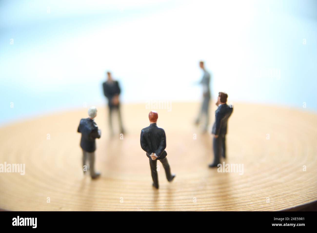 Miniature businessman having a meeting hi-res stock photography and ...
