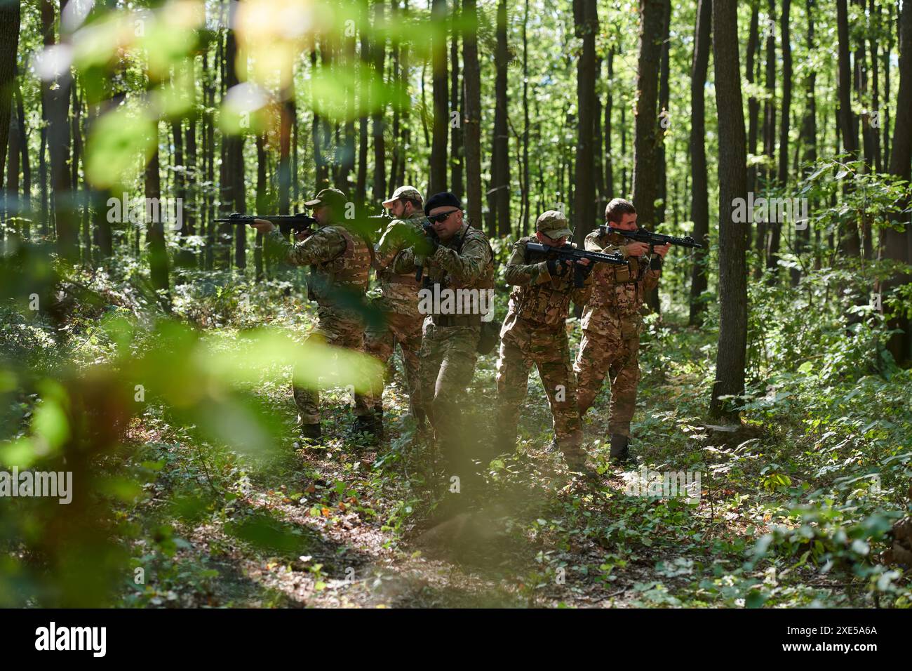 A specialized military antiterrorist unit conducts a covert operation ...