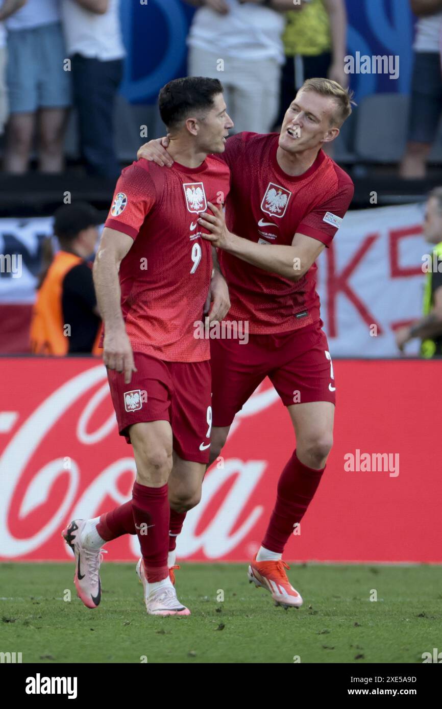 Robert Lewandowski of Poland celebrates his goal with Karol Swiderski ...