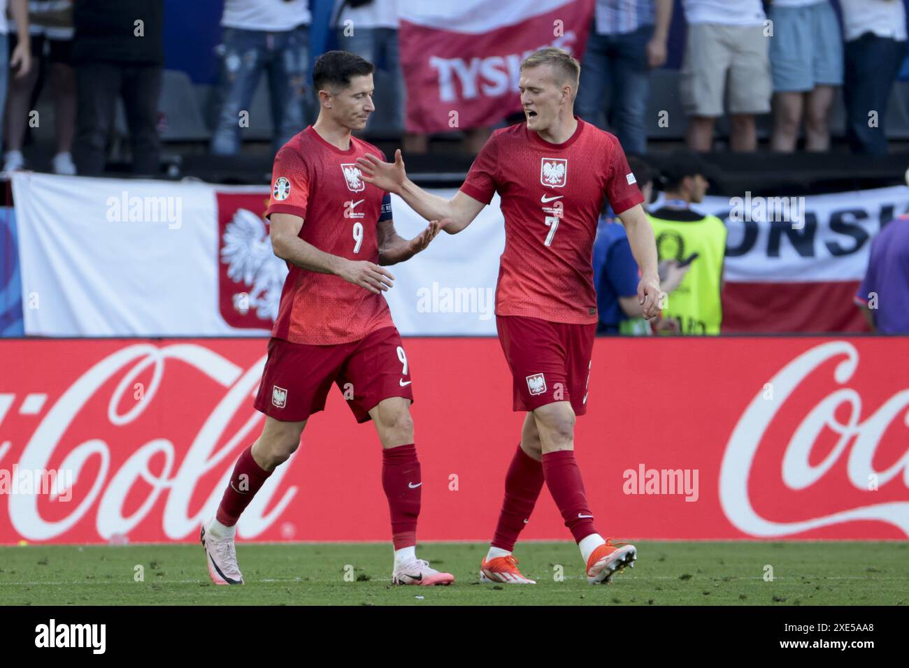 Robert Lewandowski of Poland celebrates his goal with Karol Swiderski ...