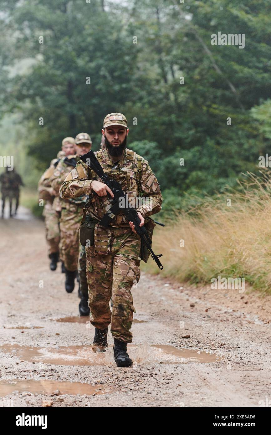 A disciplined and specialized military unit, donned in camouflage ...