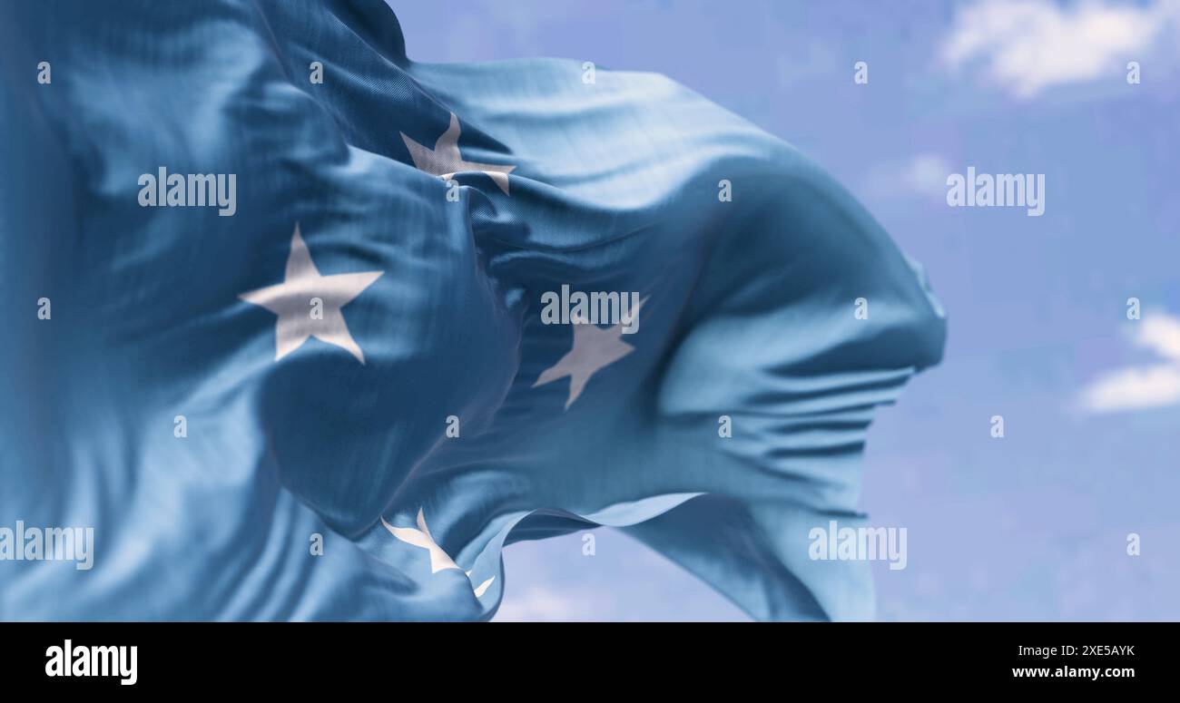 National flag of Federated states of Micronesia waving in the wind on a ...