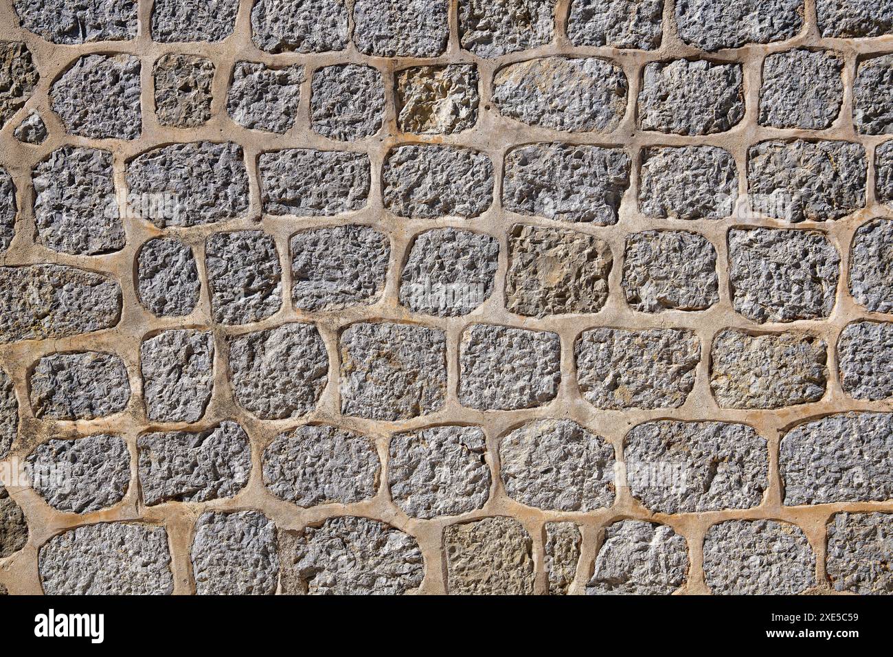 Flat lay photograph of a colorful stone wall. Stone background texture ...