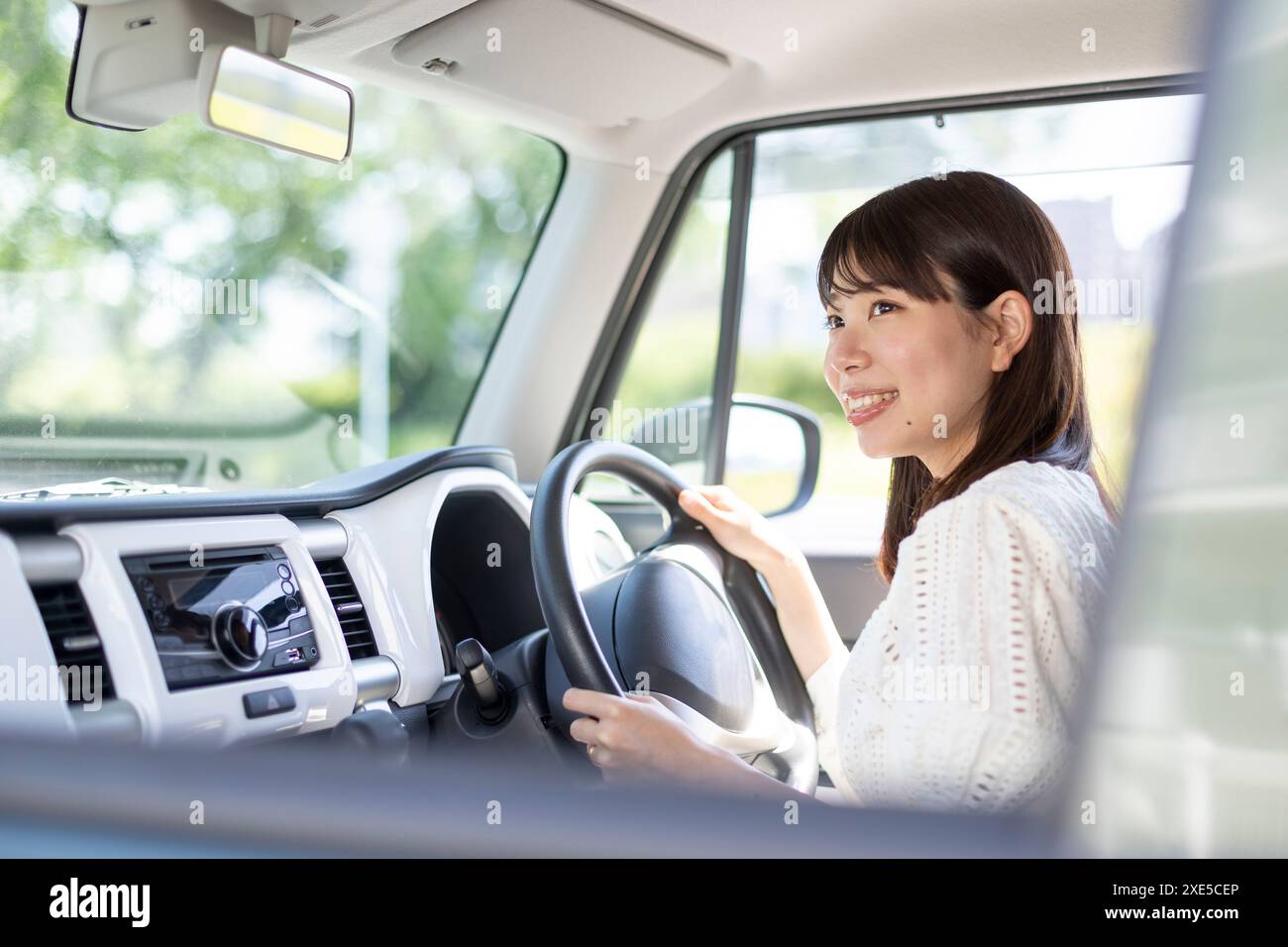 Young Japanese woman in a car Stock Photo - Alamy