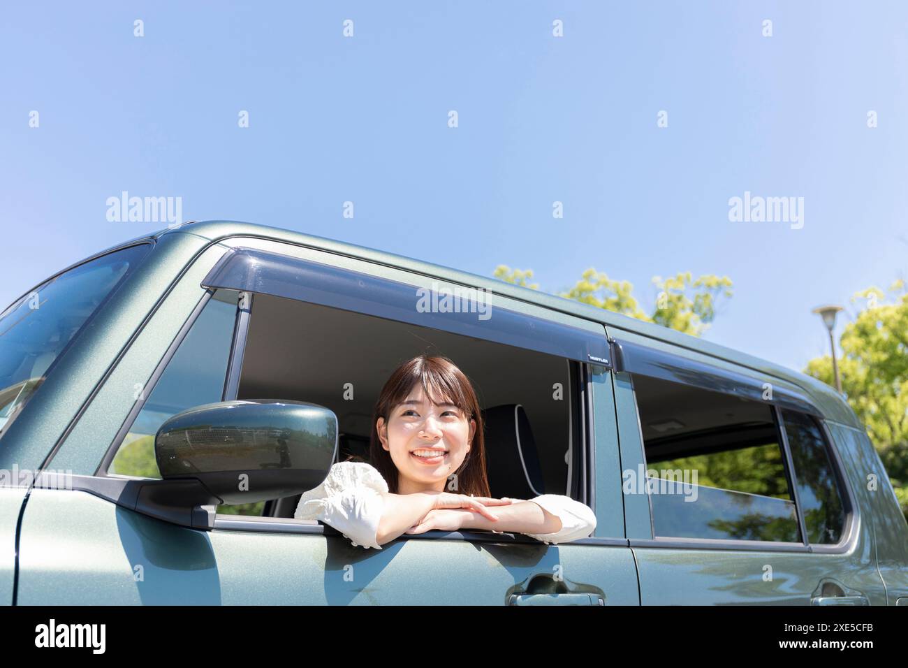 Young Japanese woman in a car Stock Photo - Alamy