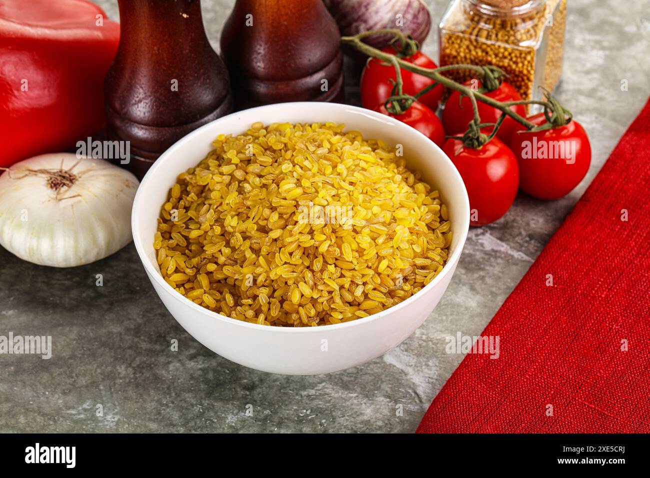 Dry wheat bulgur cereal heap for cooking Stock Photo - Alamy