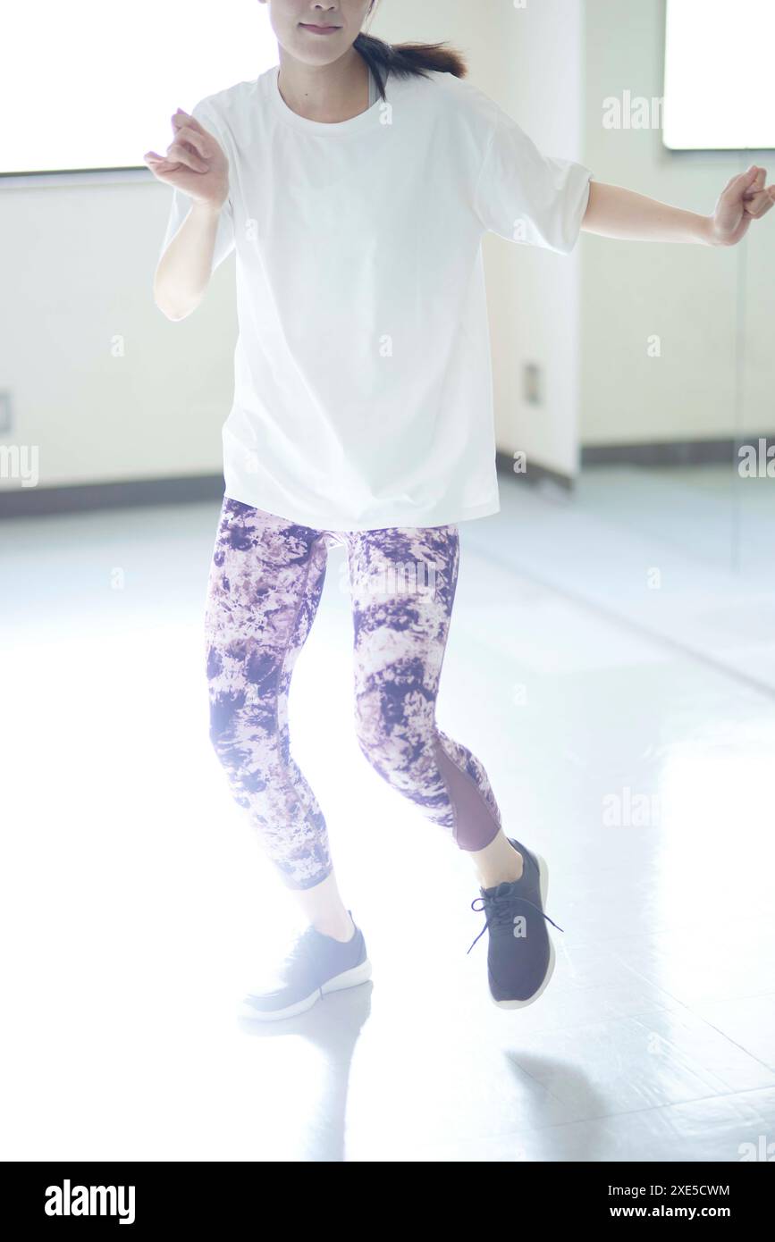 Young Japanese woman dancing Stock Photo - Alamy