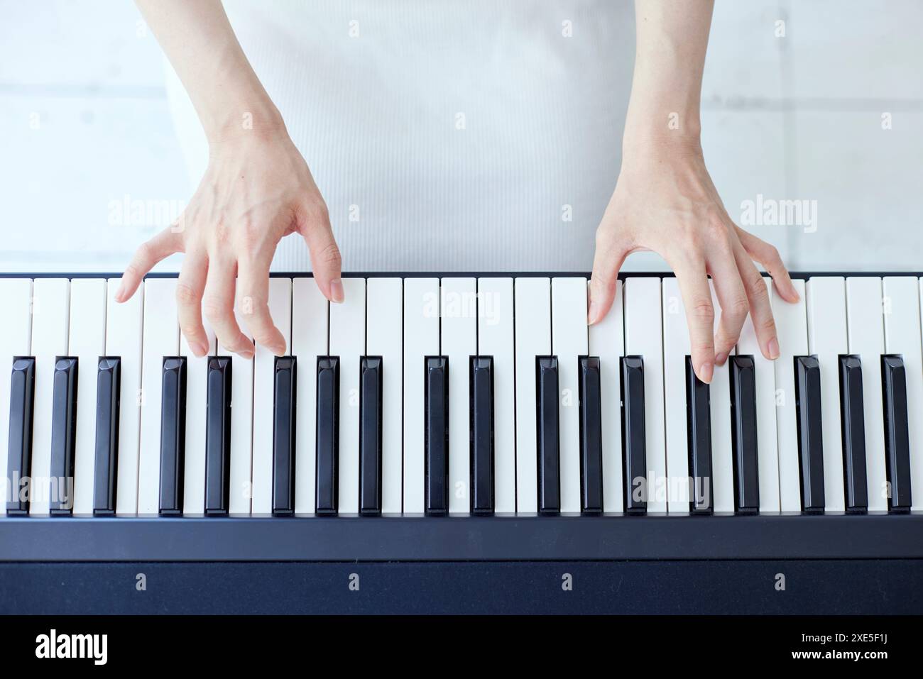 Female teacher teaching piano in hi-res stock photography and images ...