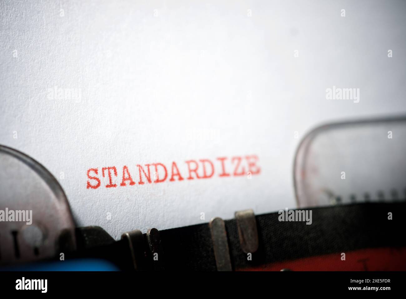 Standardize word written with a typewriter Stock Photo - Alamy