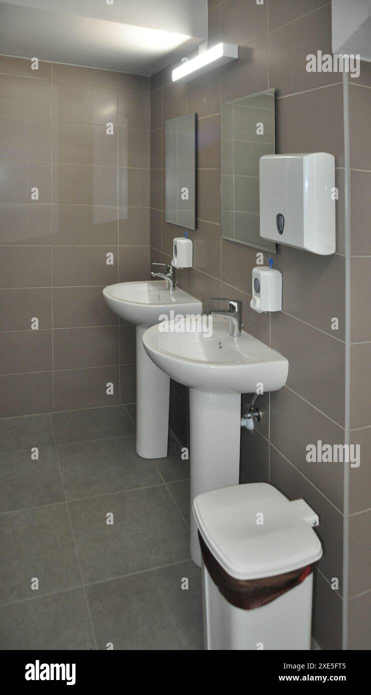 Restroom, wooden wardrobes, bench and shower rooms Stock Photo - Alamy