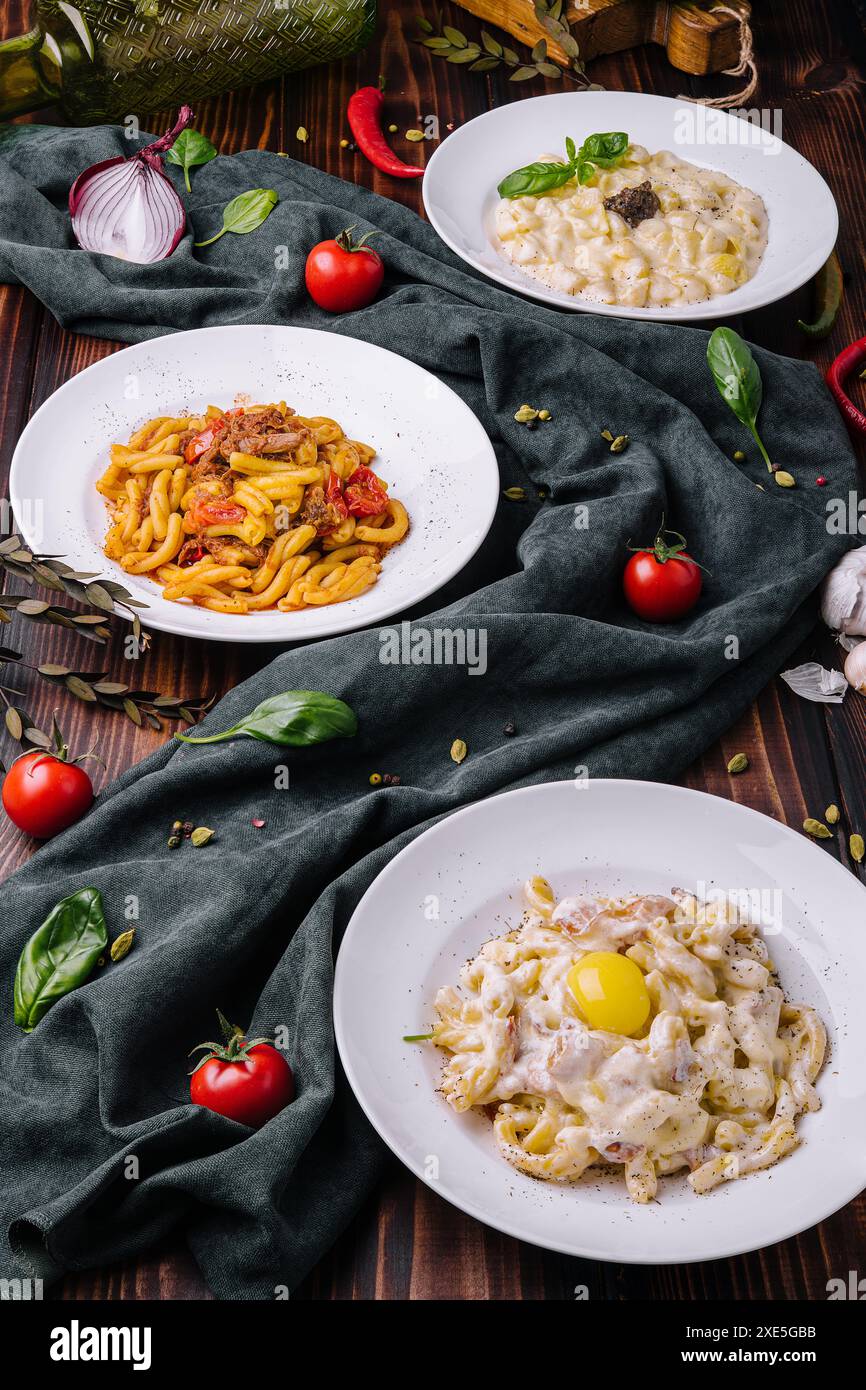 Different types of italian pasta in bowls Stock Photo - Alamy