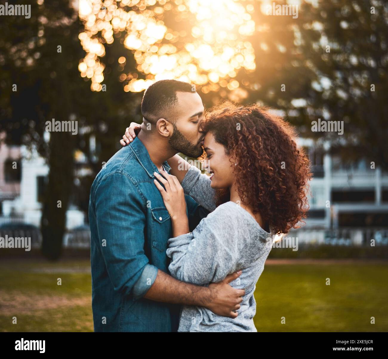 Love, hug and couple with smile, outdoor and romance with relationship ...