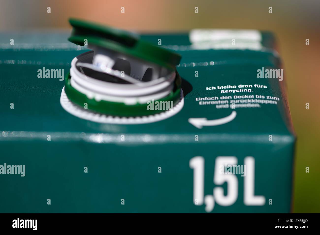 Dresden, Germany. 26th June, 2024. A juice carton stands on a table ...