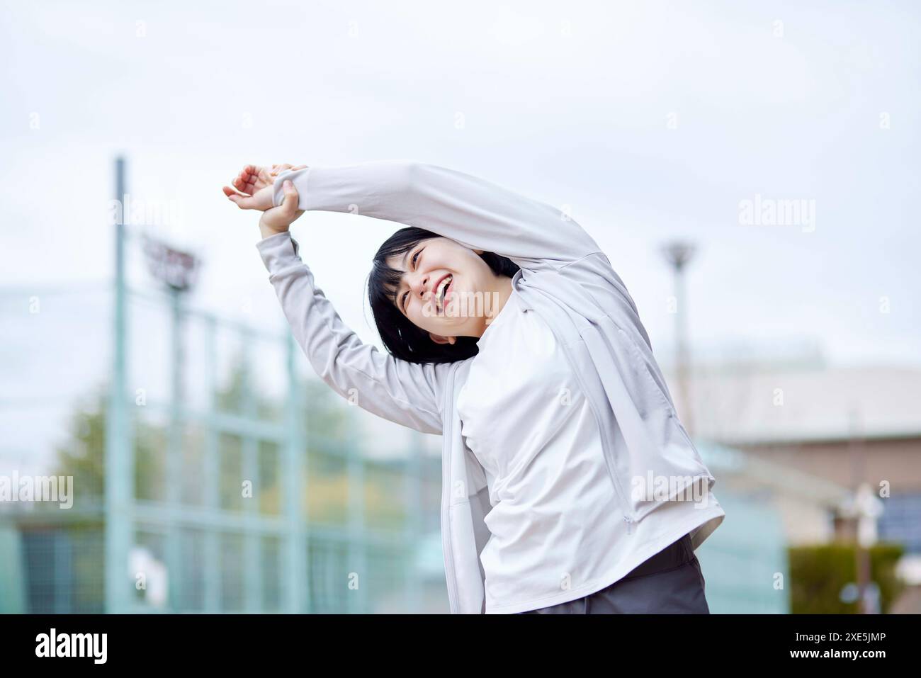 Young Japanese woman exercising Stock Photo - Alamy