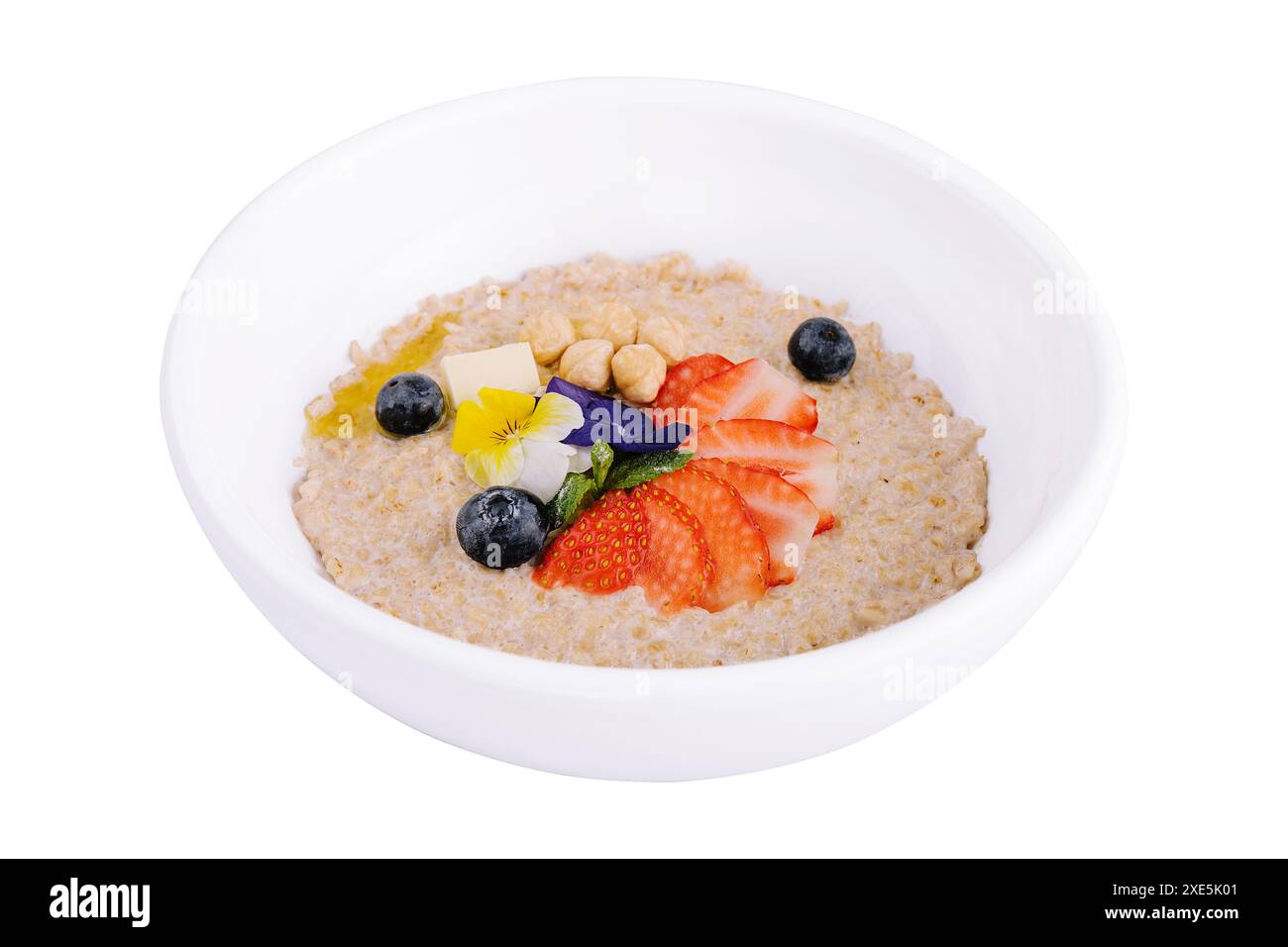 Porridge blueberries almonds Cut Out Stock Images & Pictures - Alamy