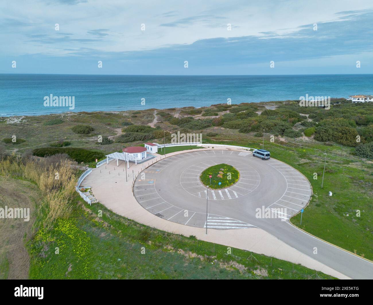 Camper van parked in a circular parking lot at Eden Beach on the ...