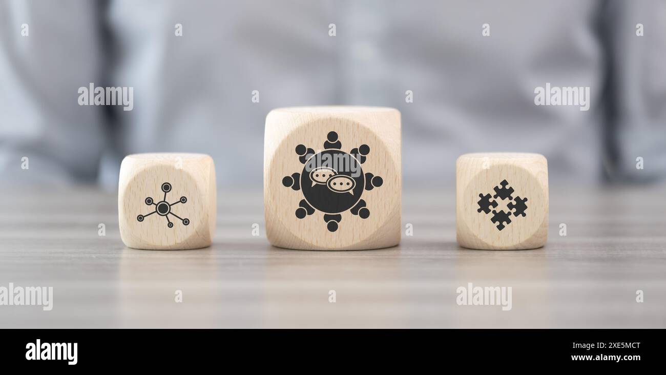 Wooden blocks with symbol of meeting concept Stock Photo - Alamy