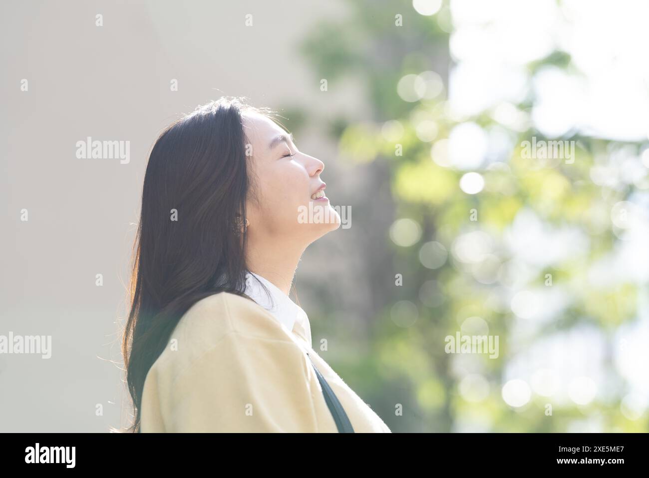 Woman taking deep breath smiling hi-res stock photography and images ...
