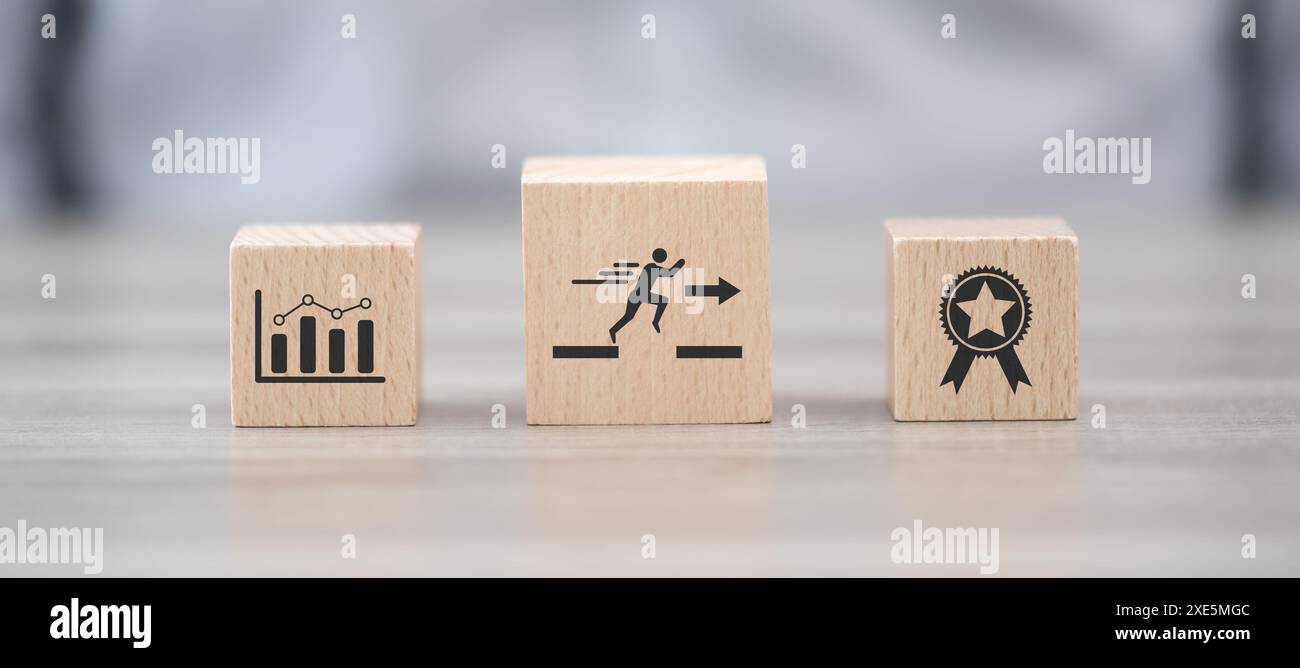 Wooden blocks with symbol of motivation concept Stock Photo - Alamy