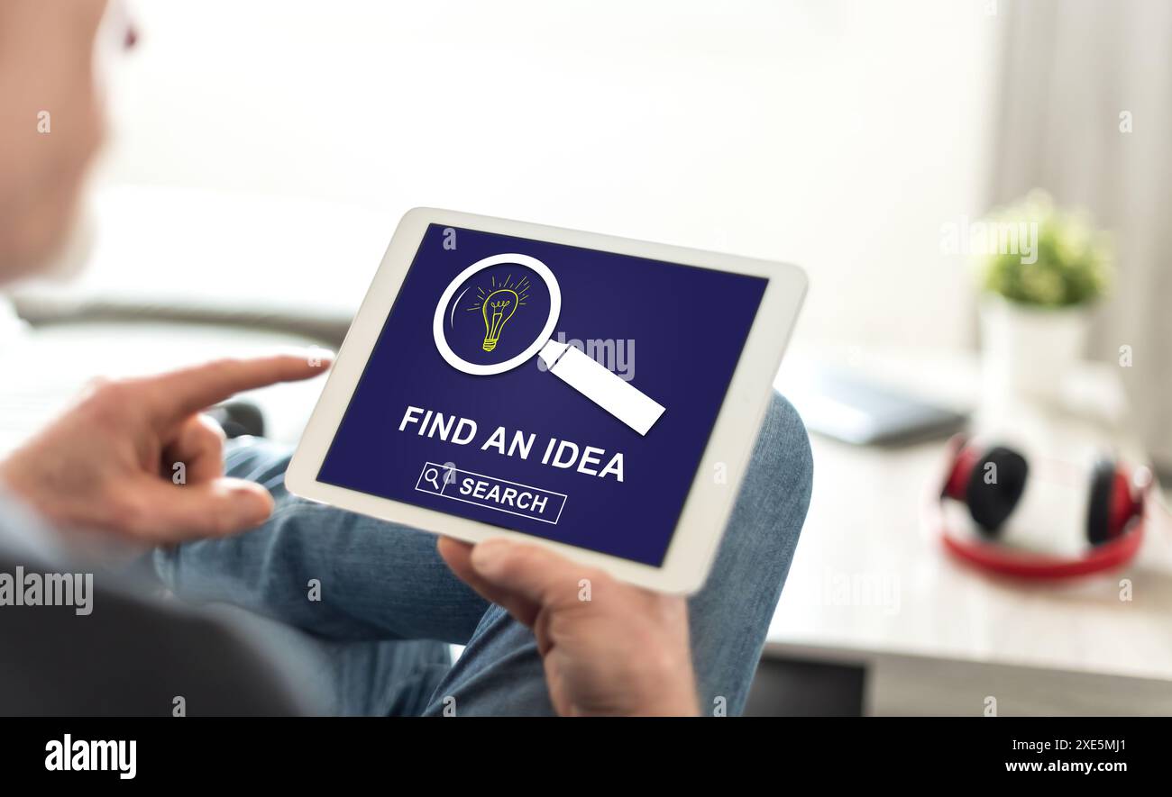 Tablet screen displaying an idea search concept Stock Photo - Alamy