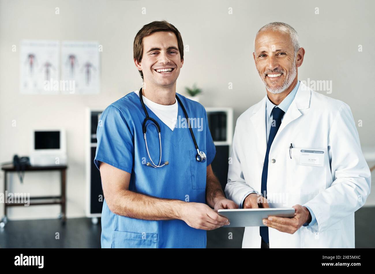 Doctor, tablet and portrait with nurse in clinic, medical collaboration ...