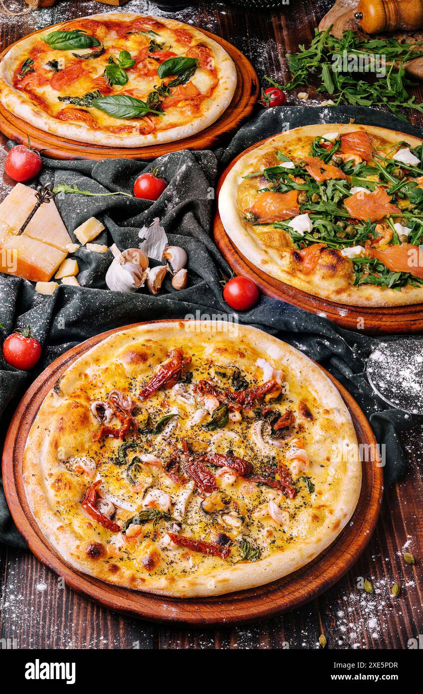 Three different pizzas pizza hi-res stock photography and images - Alamy