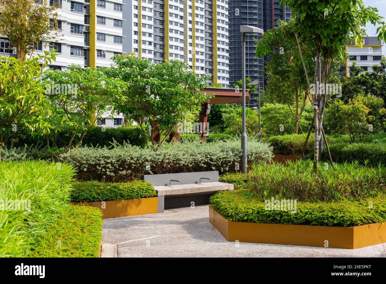 Green space facility on top of a mutl-storey carpark rooftop. Planted ...