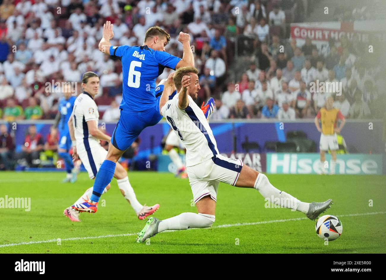 England's Harry Kane (right) fails to connect with a cross, under ...