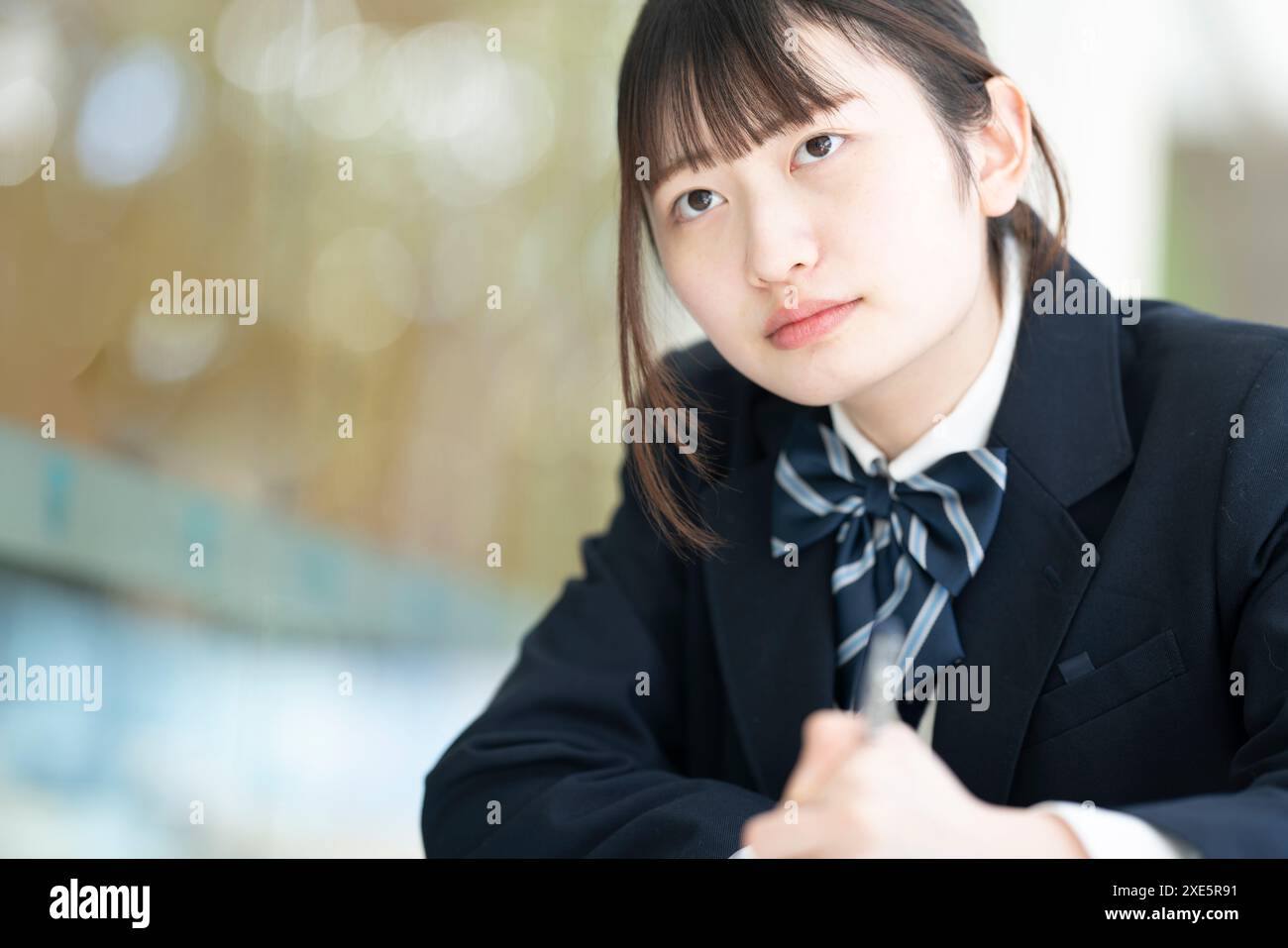 Schoolgirls in uniform studying Stock Photo - Alamy
